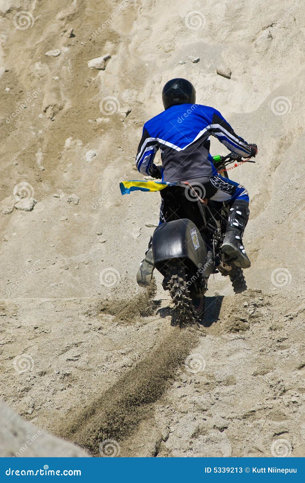 Dirt biker riding up hill stock image. Image of outdoor - 5339213