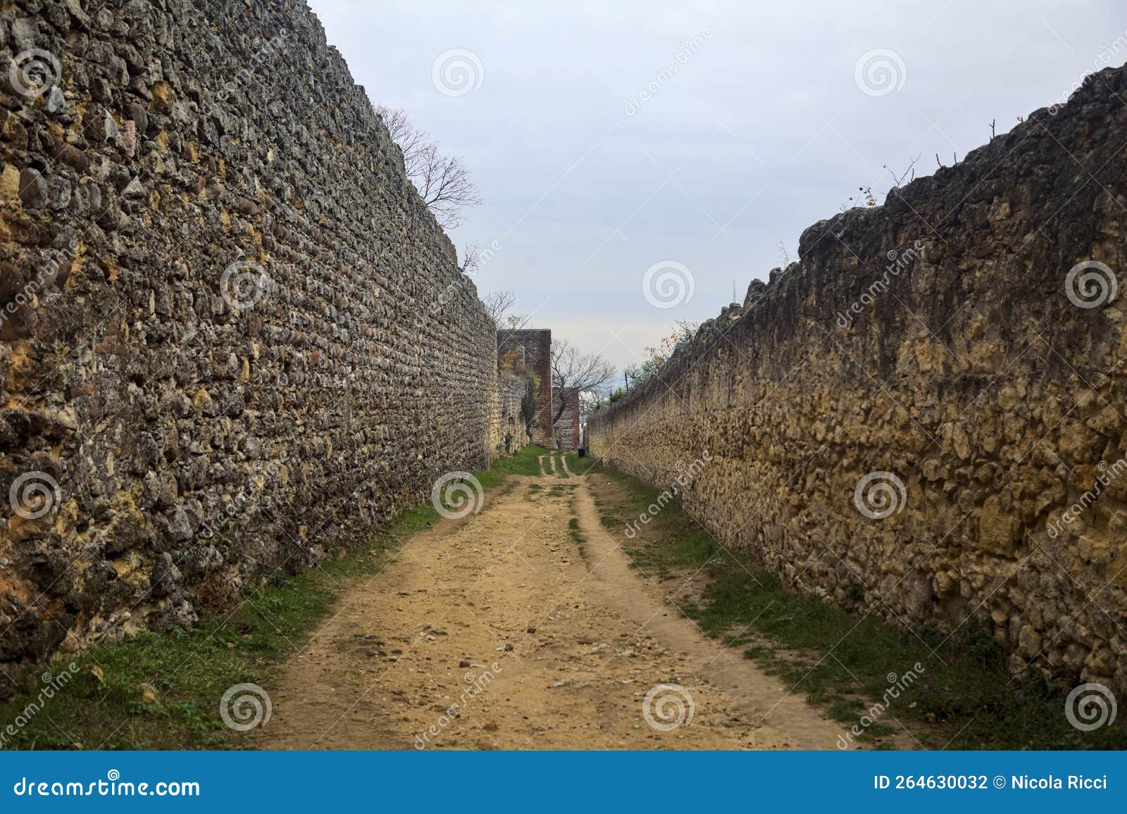 Dirt Path Bordered by Fortifications in a Park on a Cloudy Day Stock ...