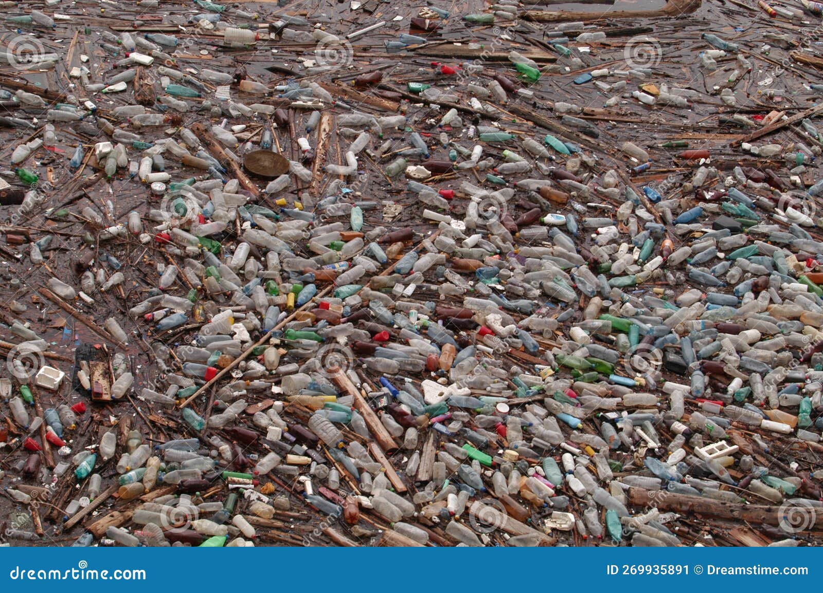 Dirt with plastic bottles stock image. Image of iron - 269935891