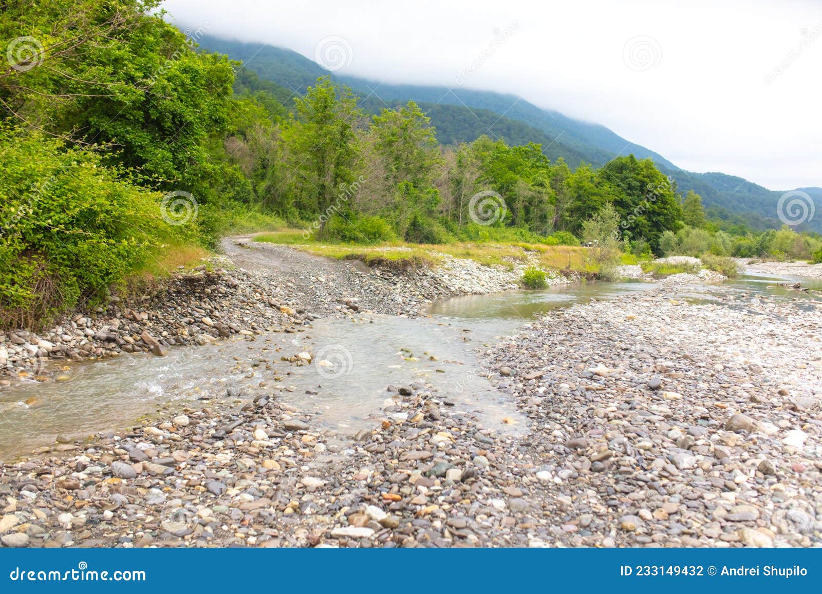 Dirt Road Along a Mountain River Stock Photo - Image of summer ...