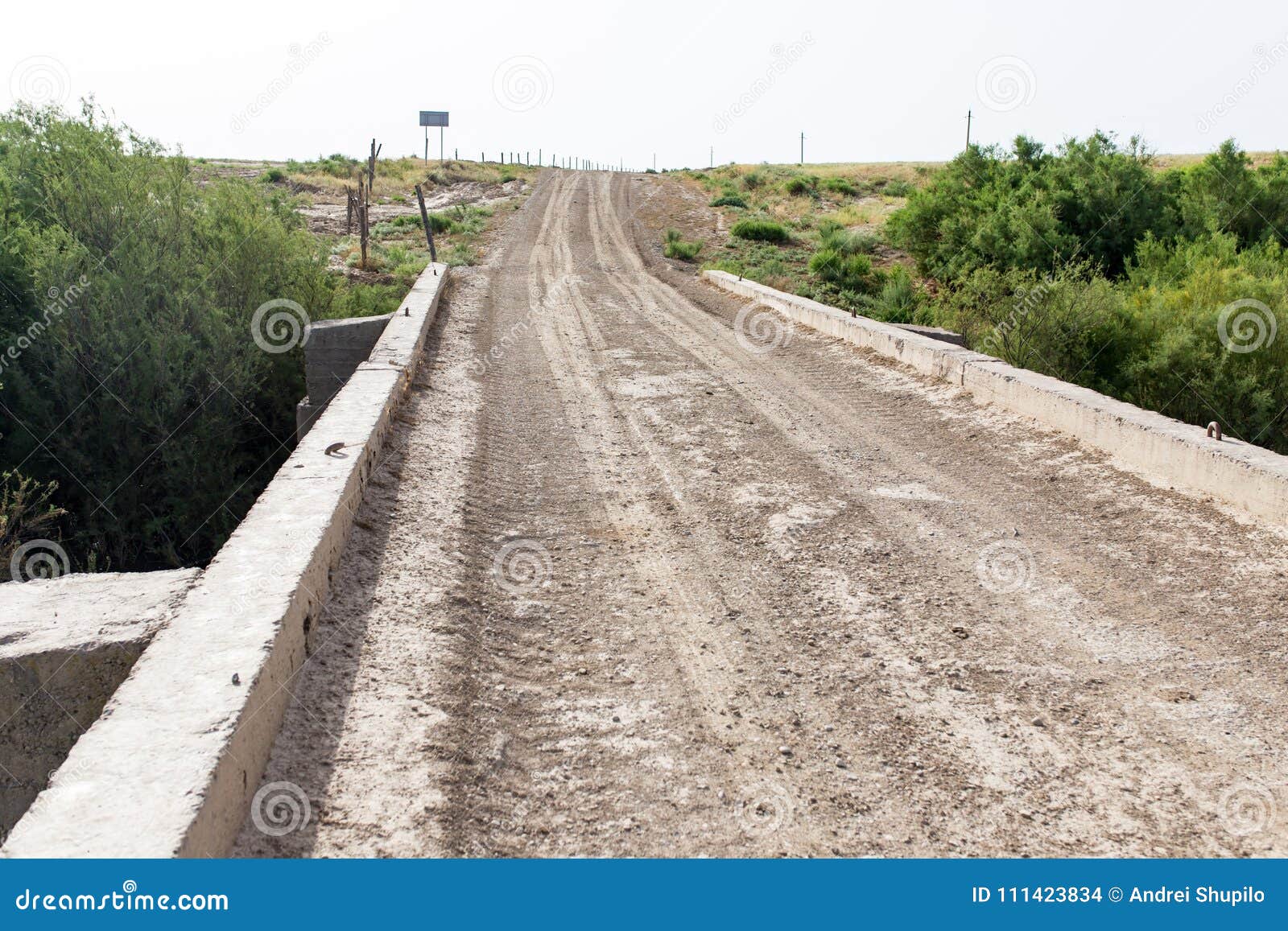 Dirt road in the desert stock photo. Image of texture - 111423834