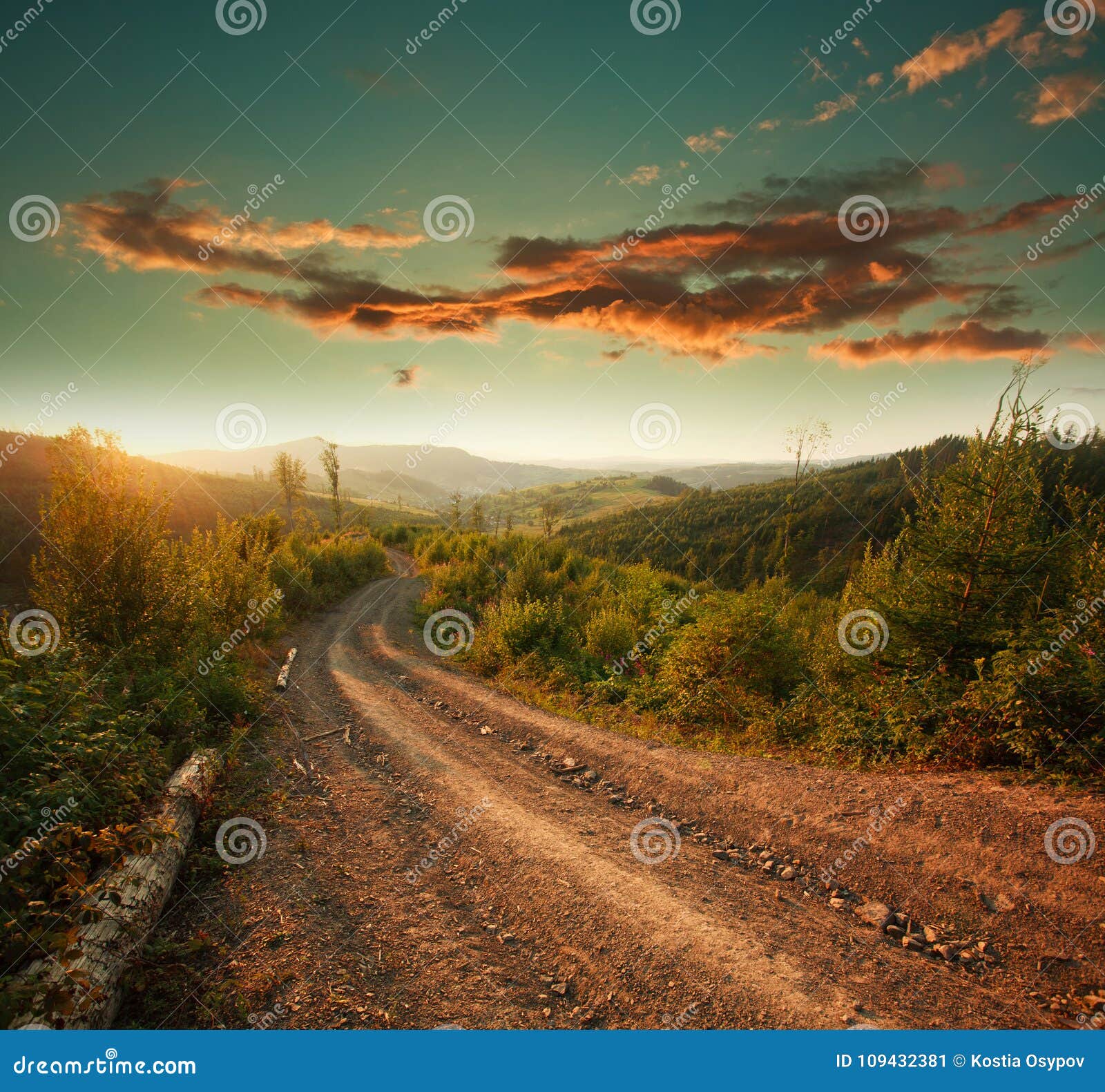 Dirt Road in Mountains at Sunset Dramatic Sky Background Stock Image ...