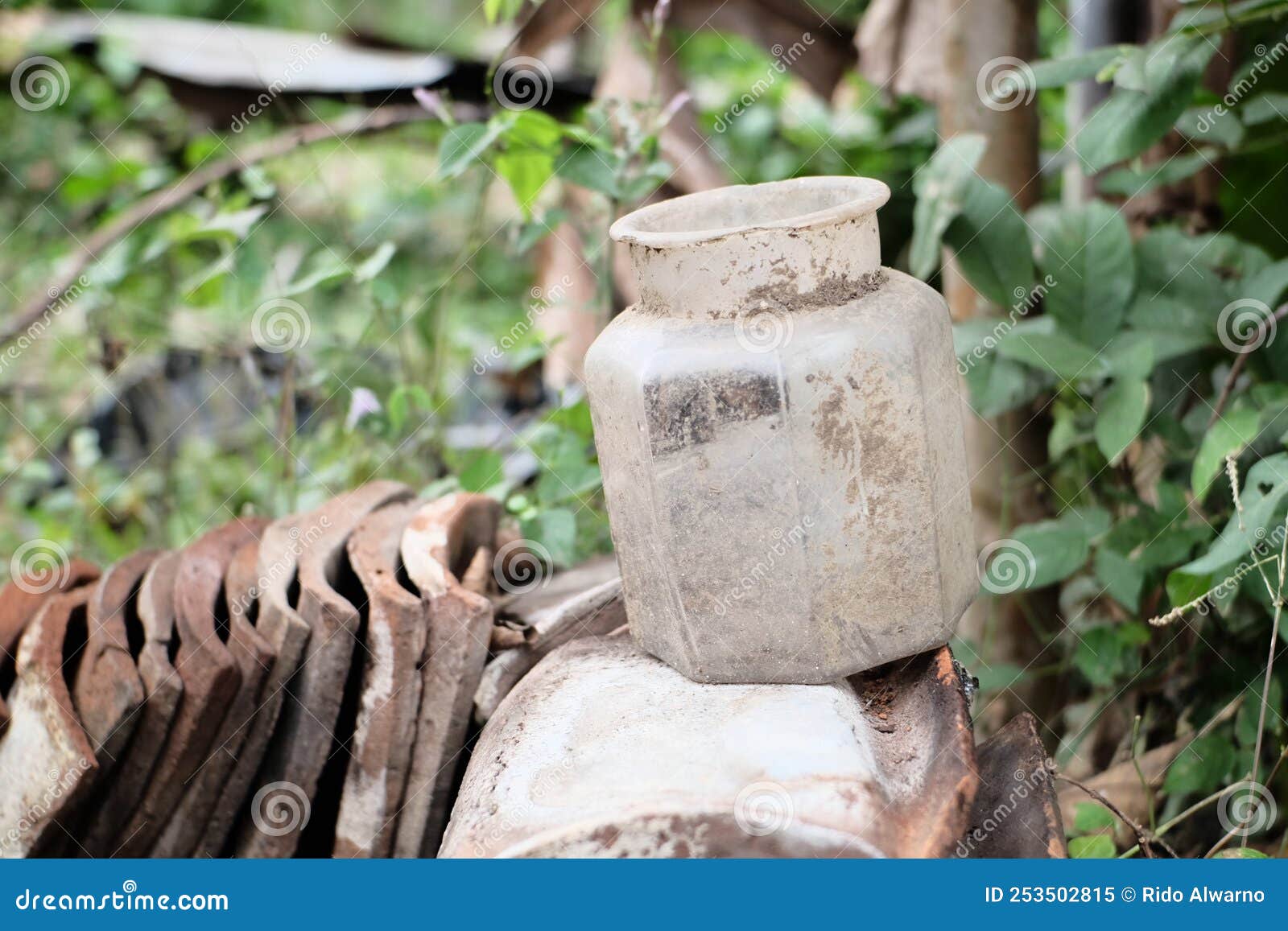 Dirty and Abandoned Jar in Unknown Place Stock Image - Image of dirty ...