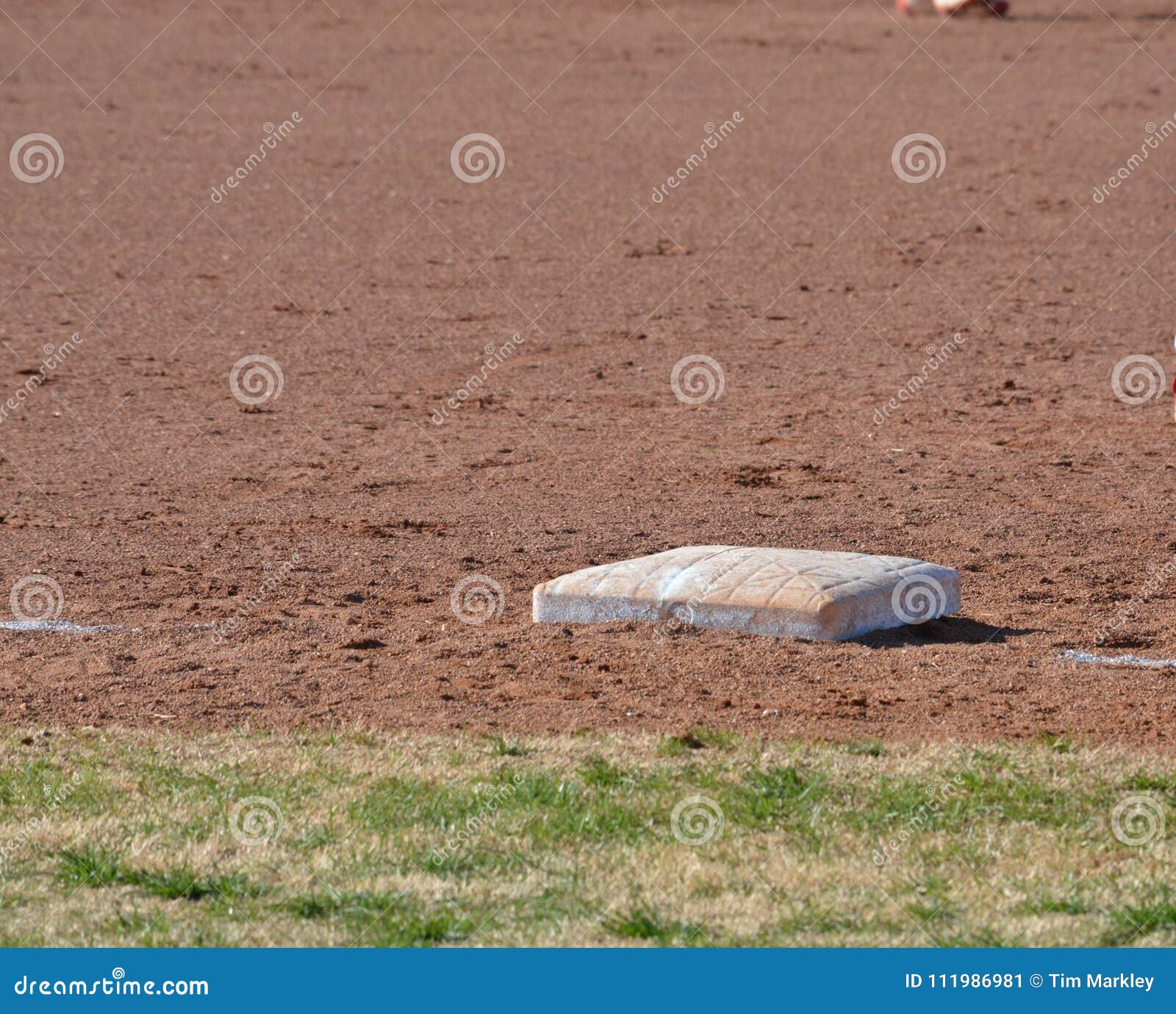 Dirty base in the infield stock image. Image of third - 111986981