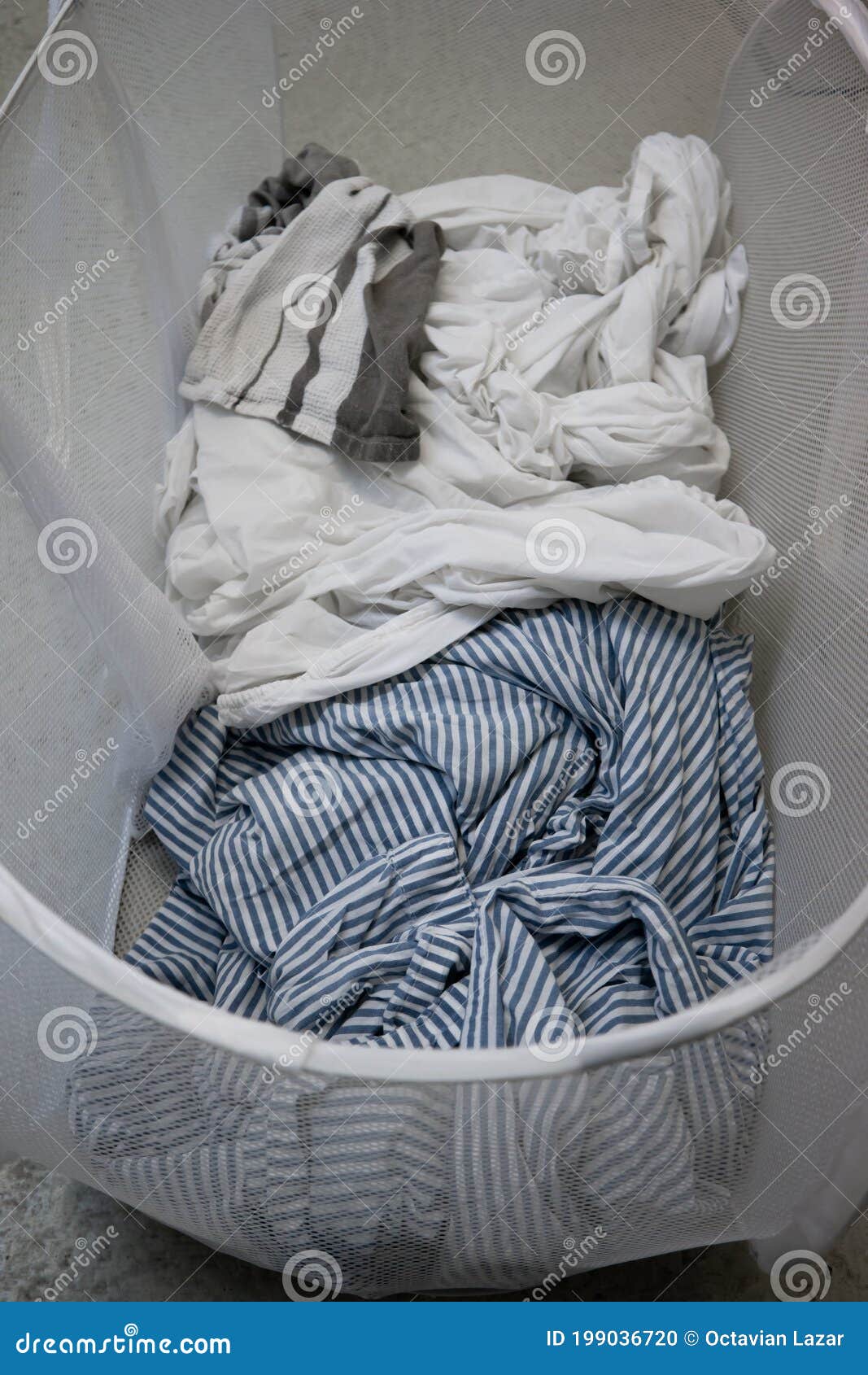 Dirty Bedding Inside Fabric Mesh Laundry Basket Top View Stock Photo ...