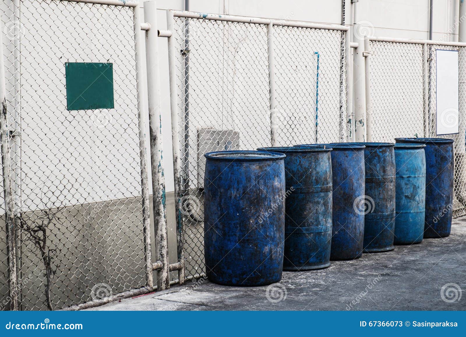 Dirty Blue Plastic Garbage Containers, with Dirty Blank Signboard Stock ...