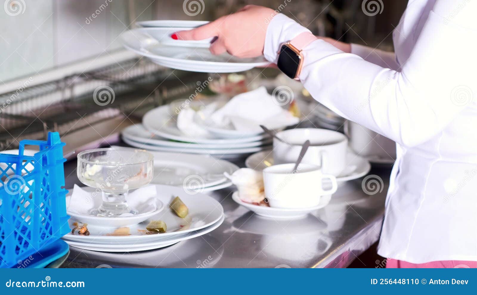 Dirty Cups and Plates with Leftovers and Silverware Placed on Metal ...