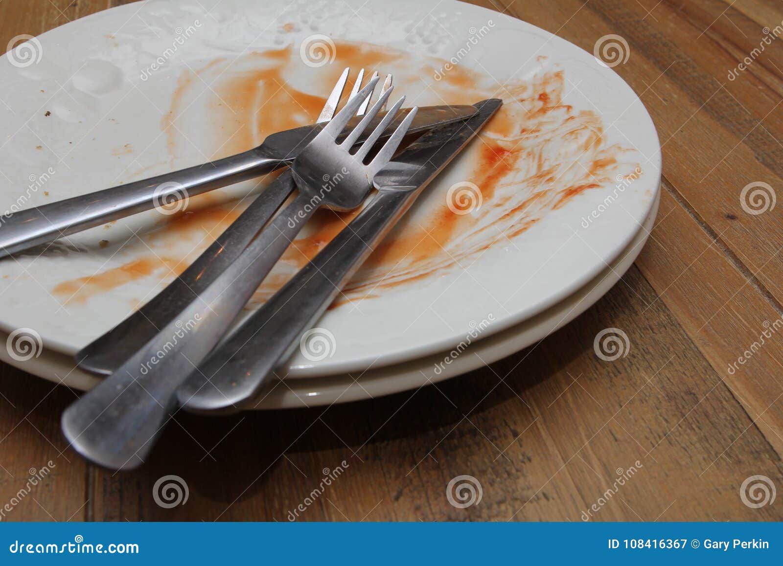 Dirty Dinner Plates and Cutlery Ready To Be Washed Up Stock Image ...