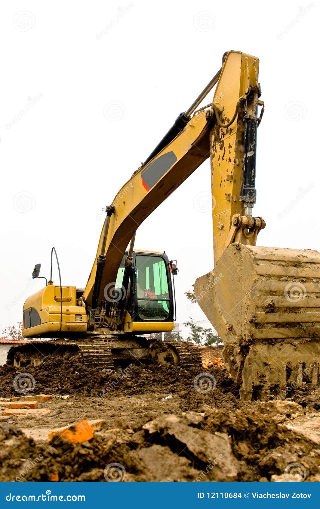Dirty Excavator Parked on the Construction Site Stock Photo - Image of ...