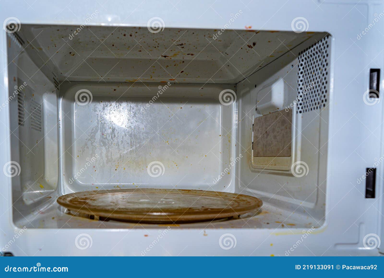Dirty Inside Surface Of The Microwave Oven. View Of The Outdoor ...
