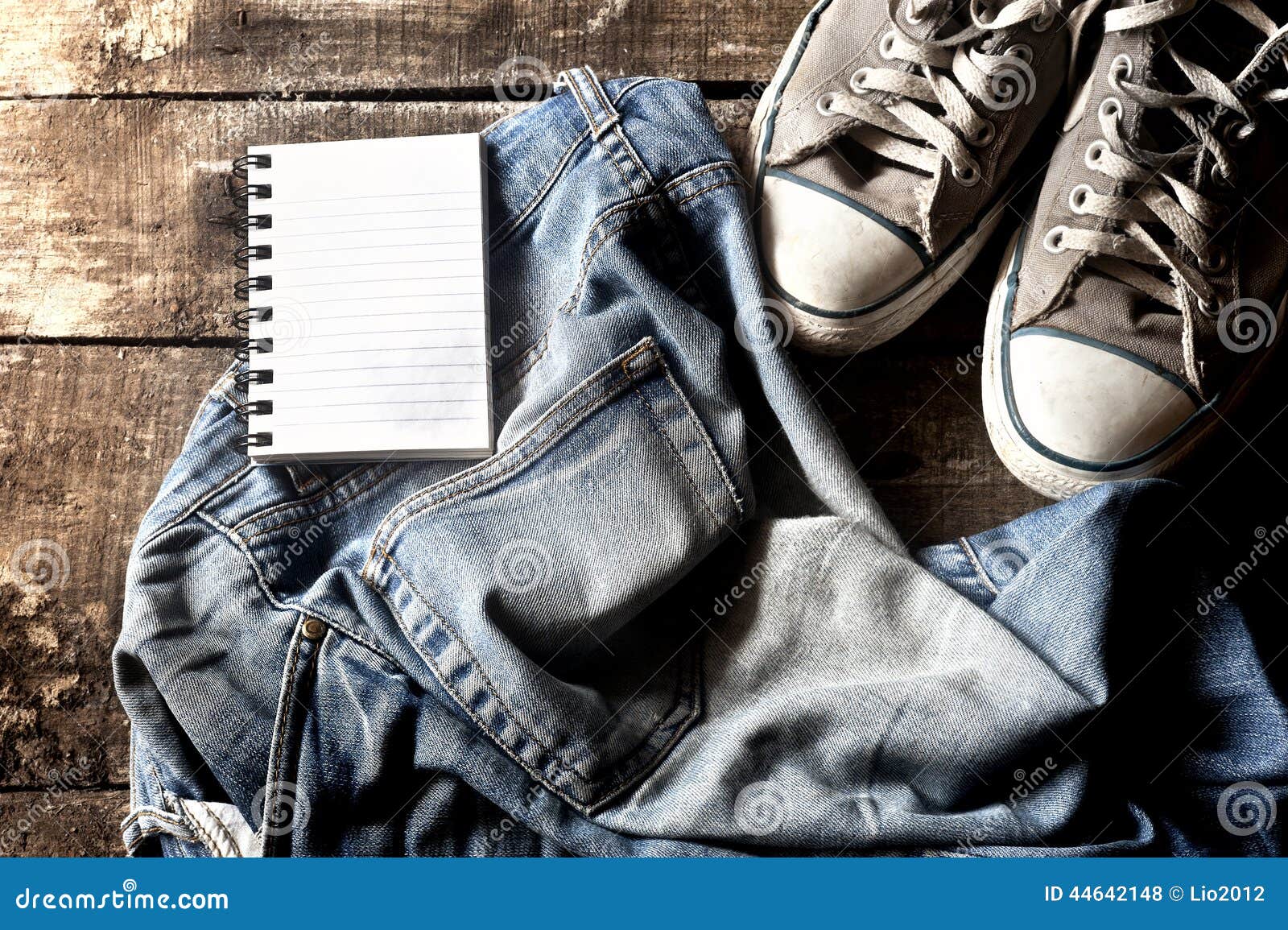 Dirty Jeans Notepad and Sneakers Stock Photo - Image of cotton, floor ...
