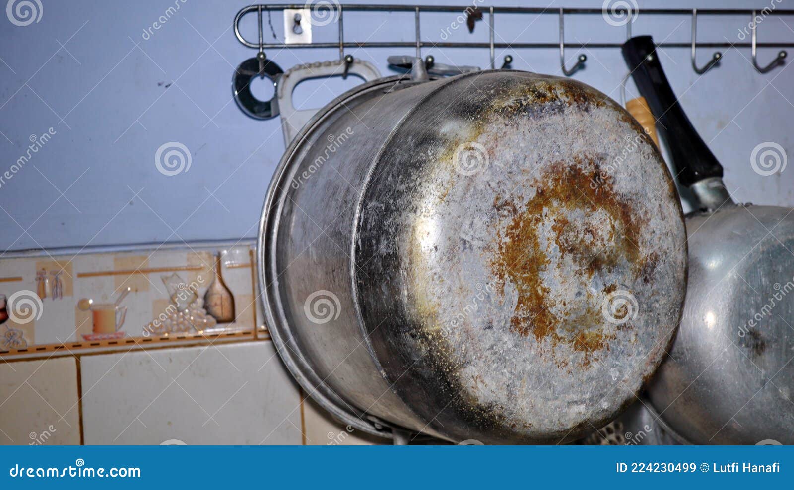 Dirty Kitchen Utensils Hanging on the Wall Stock Image - Image of ...