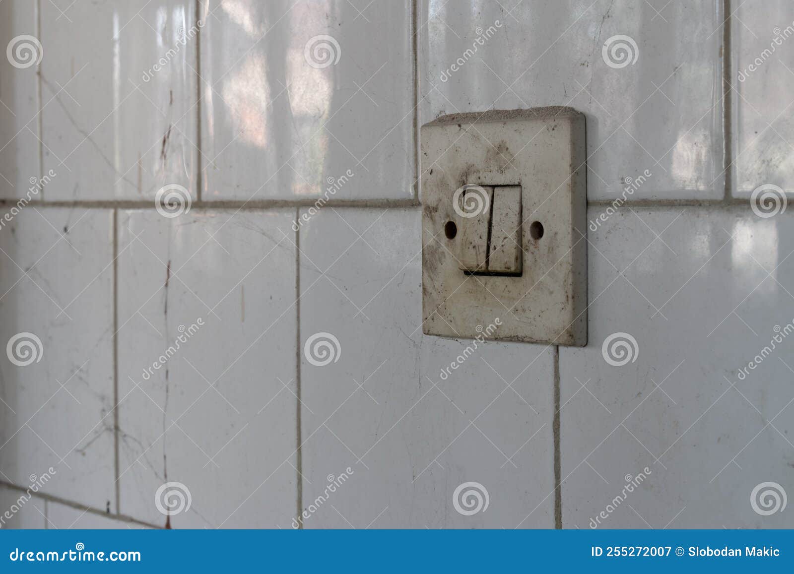 Dirty Light Switch on Tiled Wall Close Up Stock Image - Image of urban ...