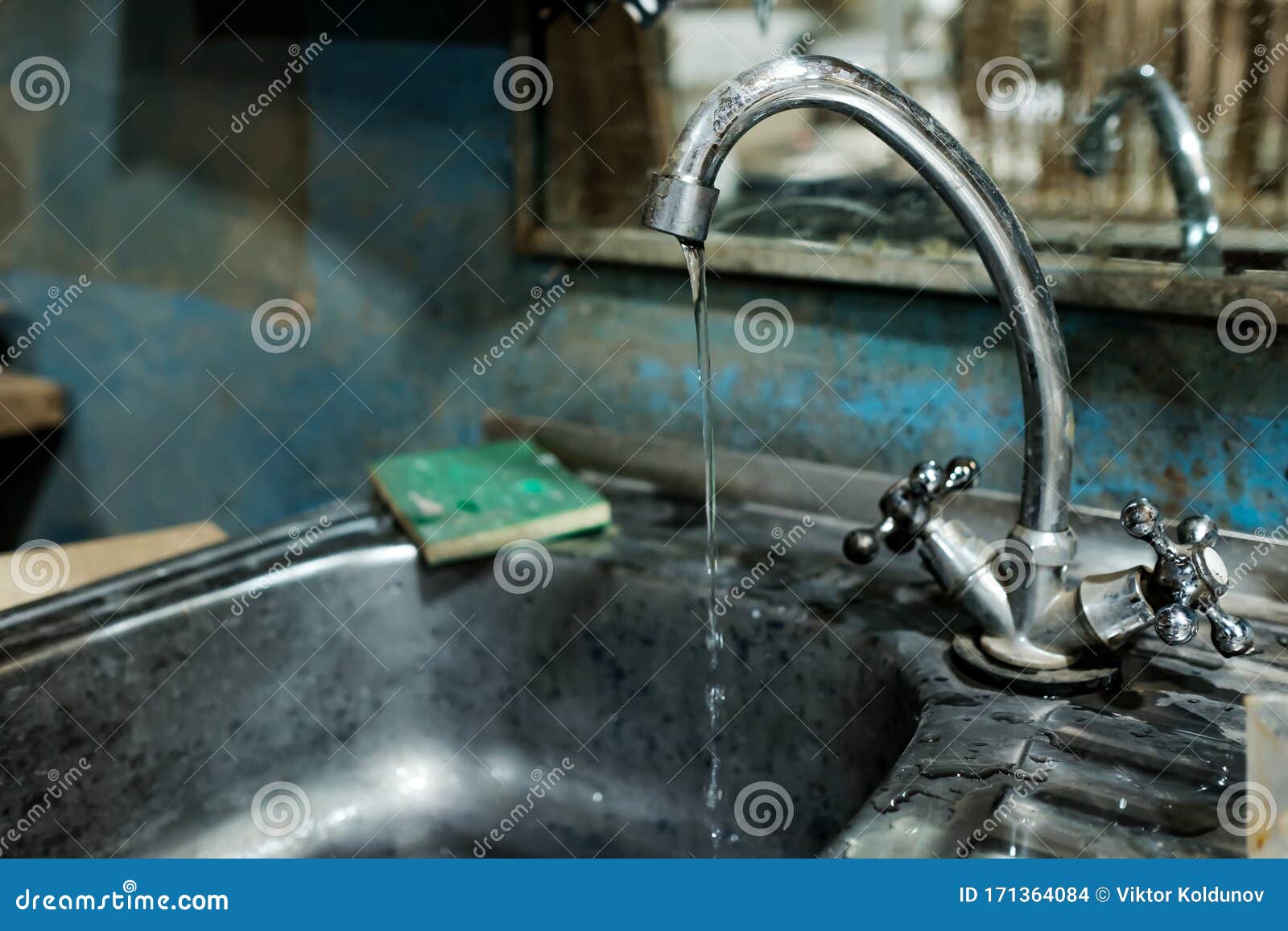Dirty Little Wash Basin for Hands. Rusty Water Flows from the Tap Stock ...