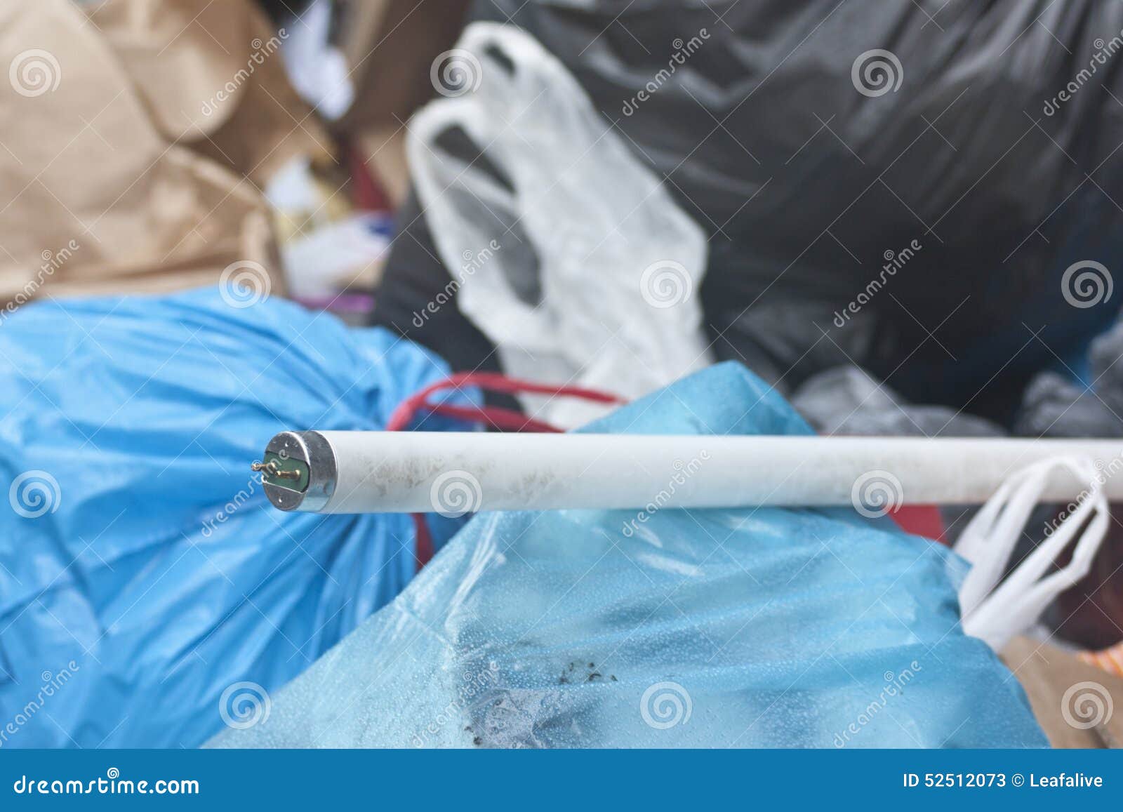 Dirty Neon Light Bulb in the Waste Stock Image - Image of bulb, package ...