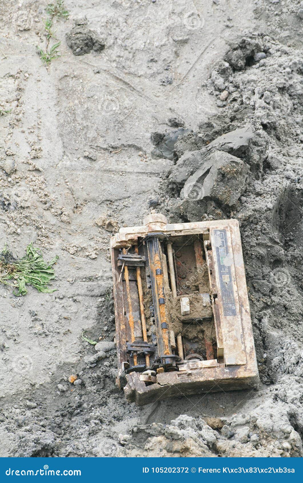 Broken Printer in the Mud stock photo. Image of grungy - 105202372