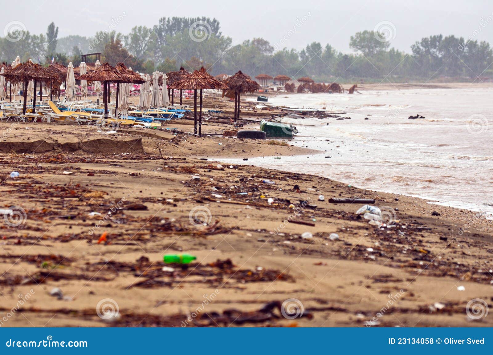 A dirty polluted beach stock photo. Image of plastic - 23134058