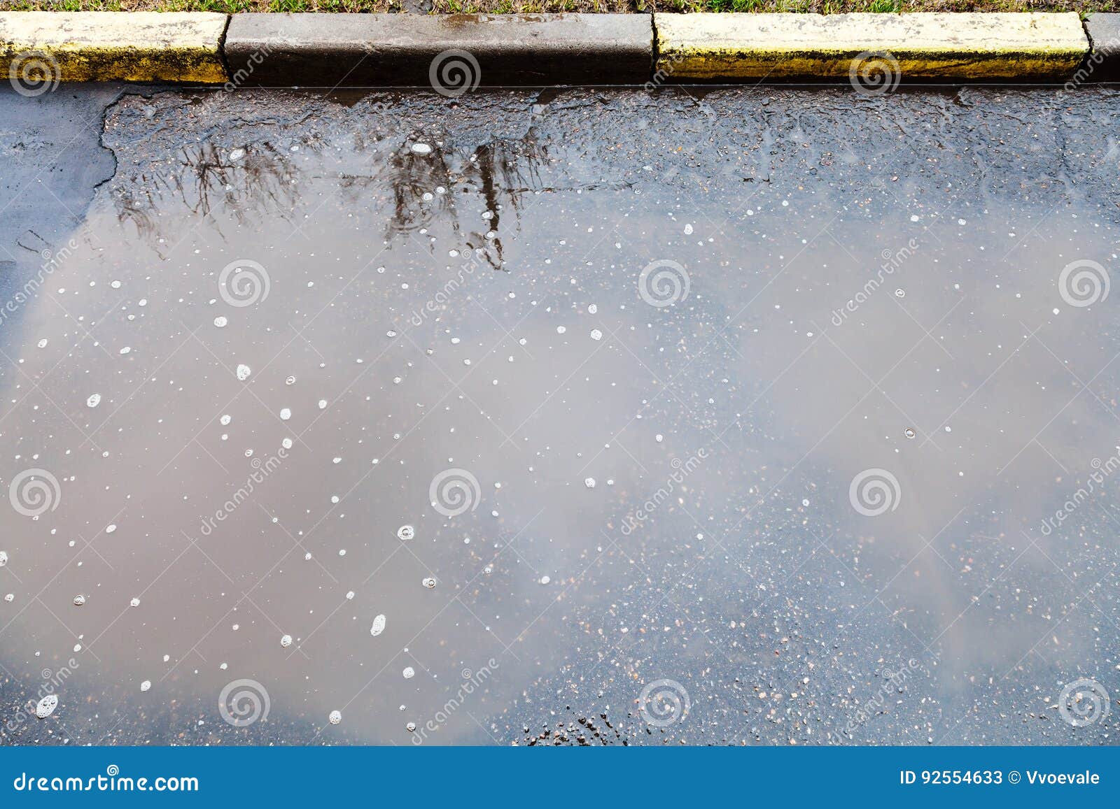 Dirty Puddle on Urban Streen in Rain Stock Image - Image of rainy, rain ...