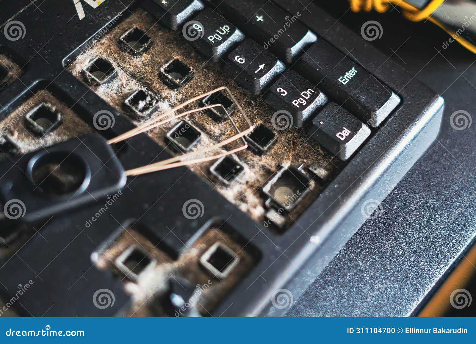 Dirty Qwerty Keyboard Full of Dusts and Debris on the Table. Cleaning ...