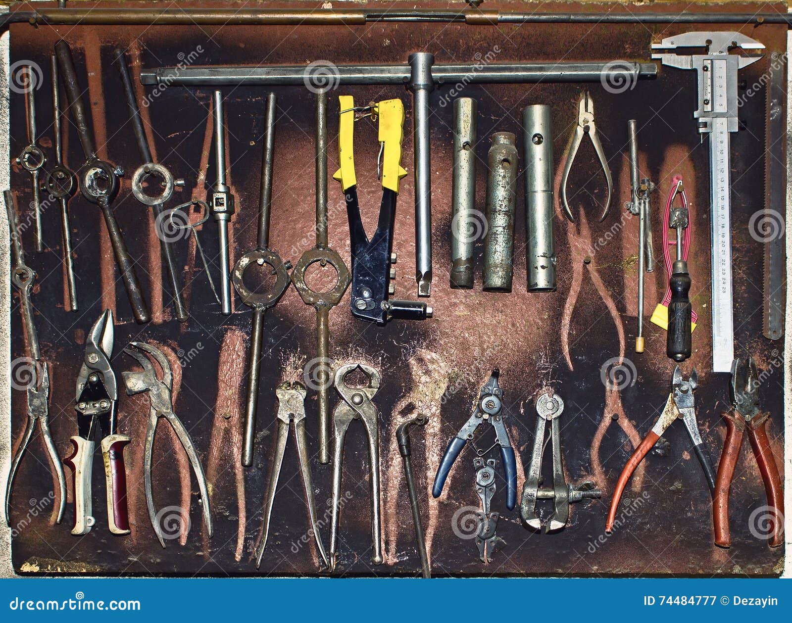 Dirty Set of Hand Tools on a Wooden Panel Stock Image - Image of dark ...