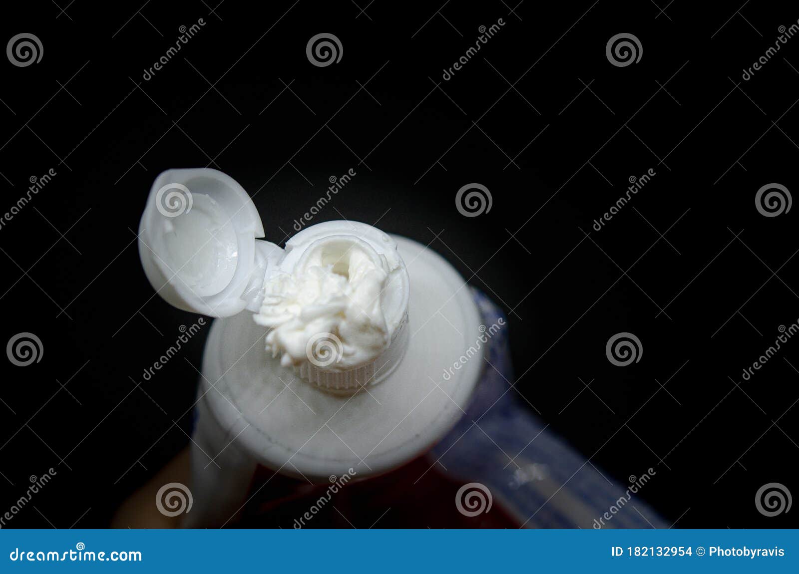 Dirty toothpaste tube stock photo. Image of background - 182132954