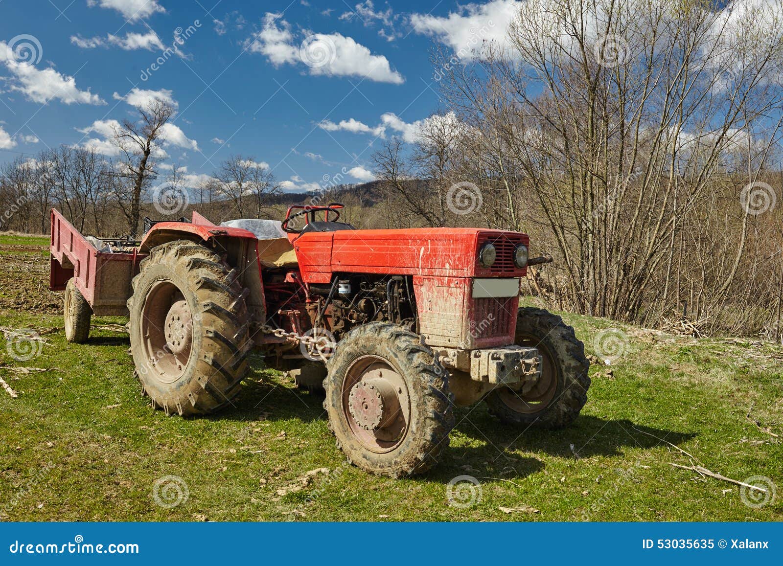 Dirty tractor on a field stock image. Image of equipment - 53035635