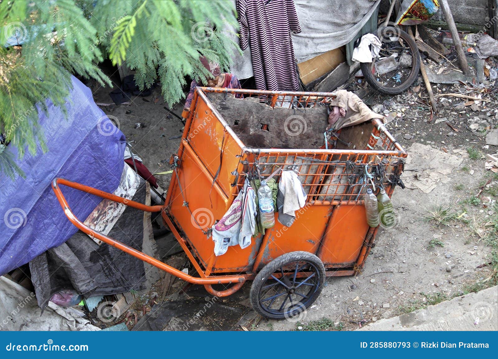 Dirty trash cart in a slum stock image. Image of equipment - 285880793