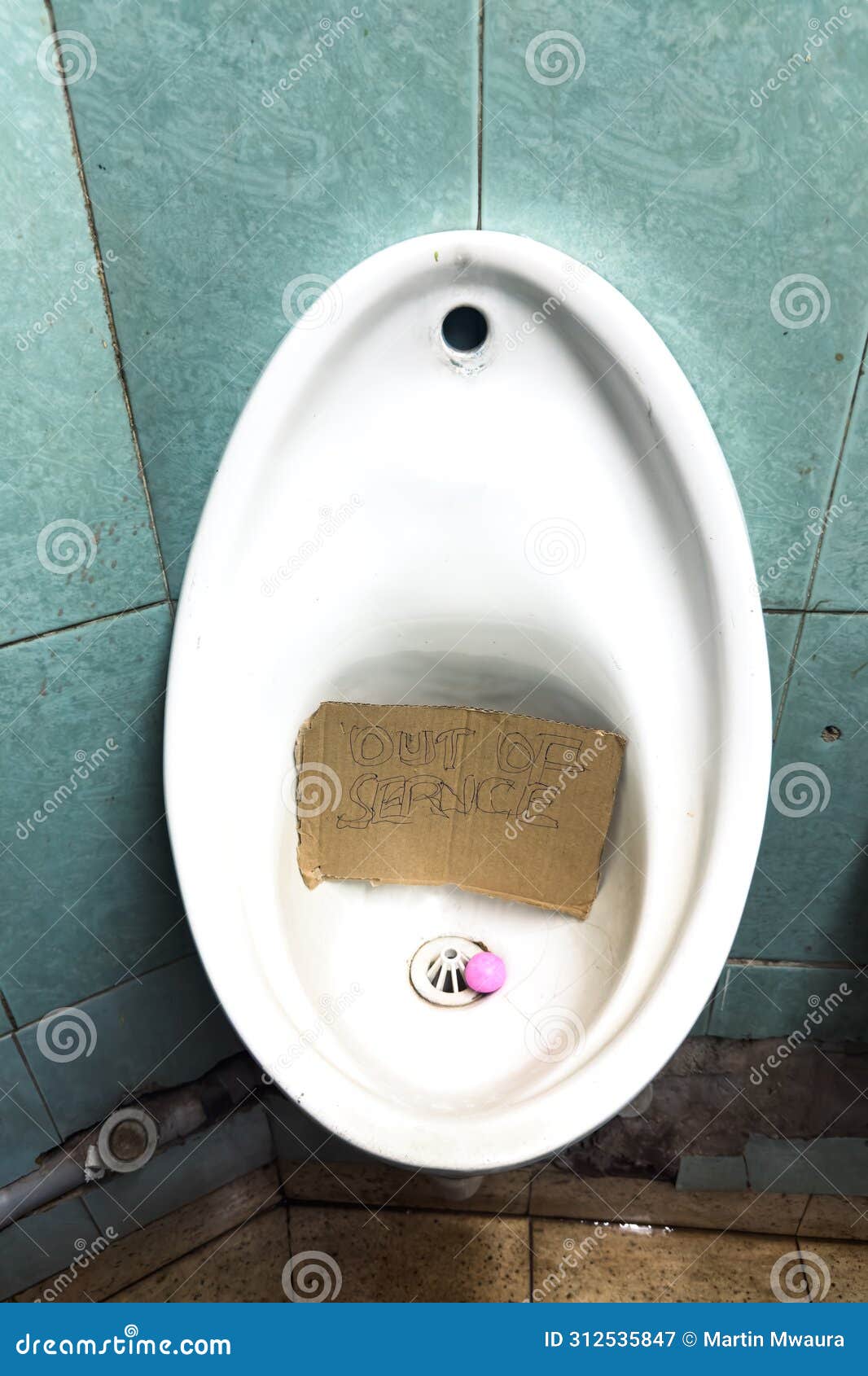 A Dirty Urinal Basin with an Out of Service Sign Stock Image - Image of ...