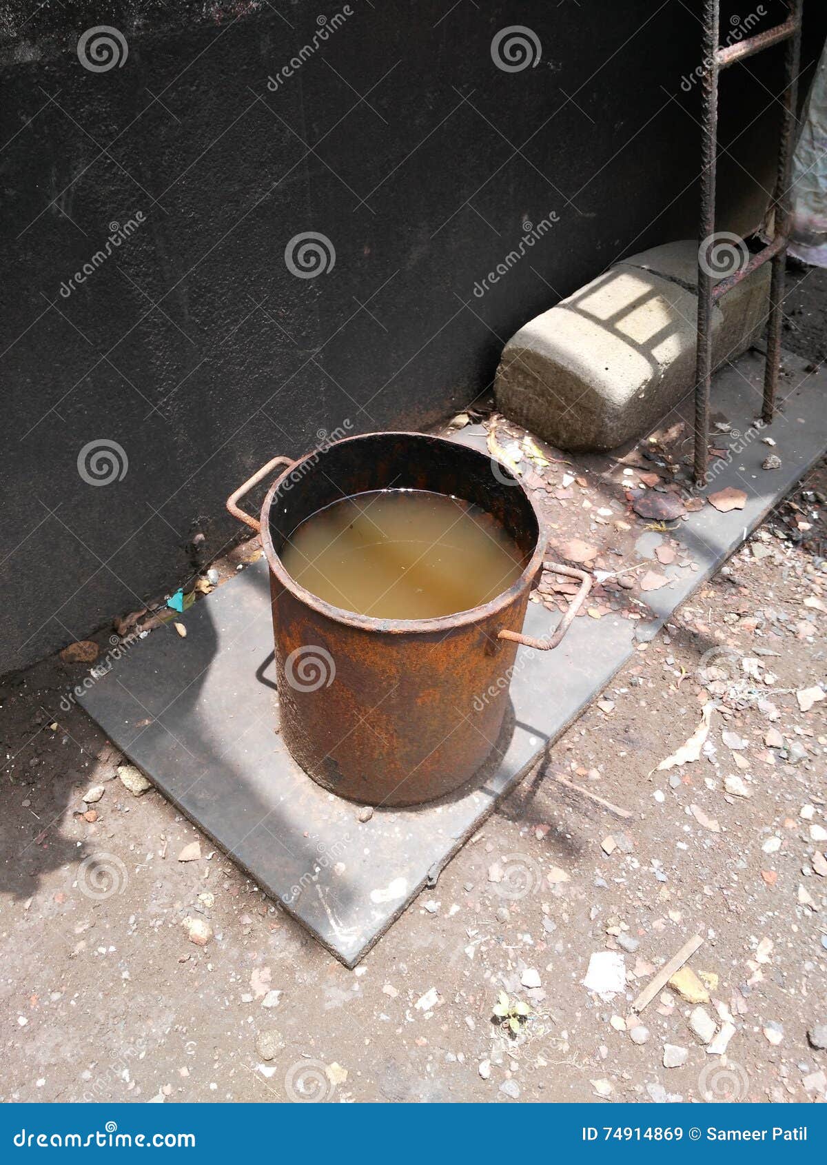 Dirty water bucket stock image. Image of junkyard, backyard - 74914869