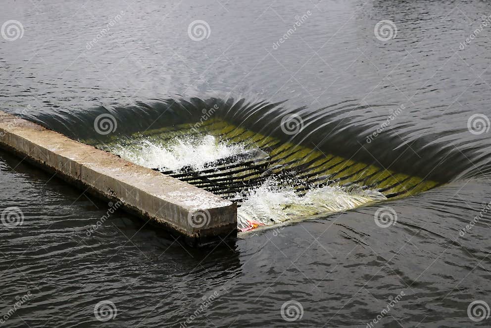 Dirty Water Flows Down through the Grate on Street Stock Image - Image ...