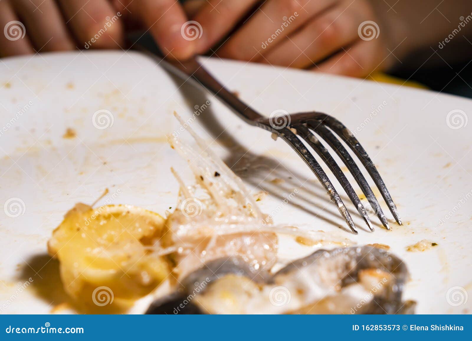 Fishbone With Fork And Knife In A Beautiful Plate Royalty-Free Stock ...