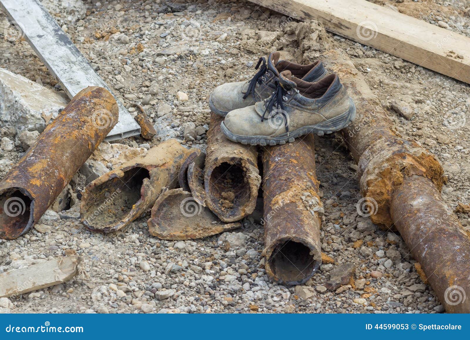 Dirty Work Boots on Old Pipes Stock Image - Image of clothing, worker ...