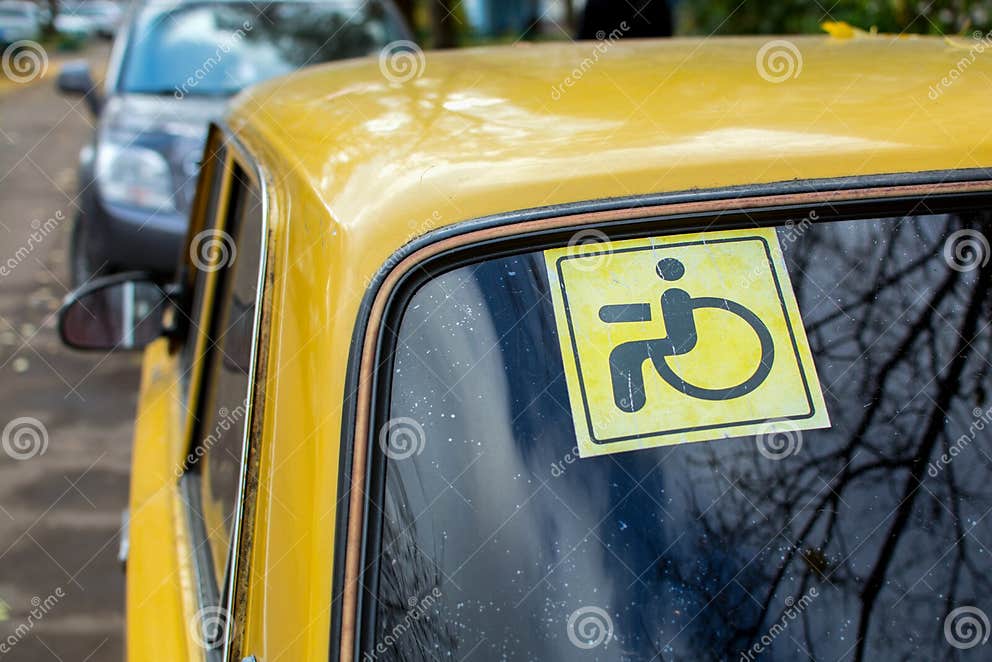 Disability mark on the car stock photo. Image of physical - 206631856