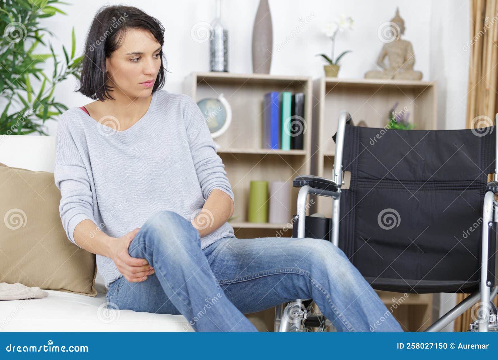 Disable Woman Sitting on Sofa Stock Photo - Image of attractive, chair ...