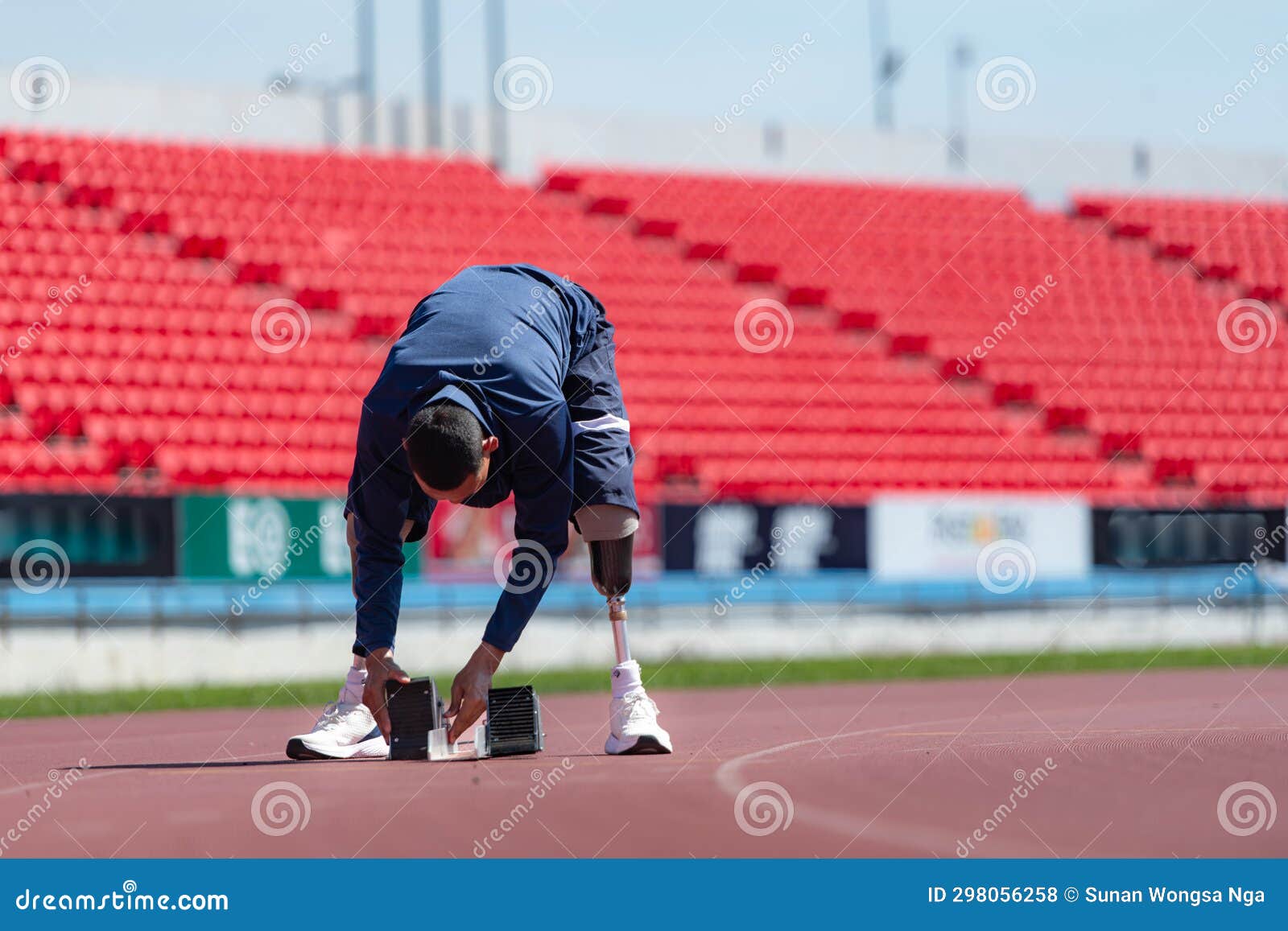 Disabled Athletes Prepare in Starting Position Ready To Run Stock Photo ...