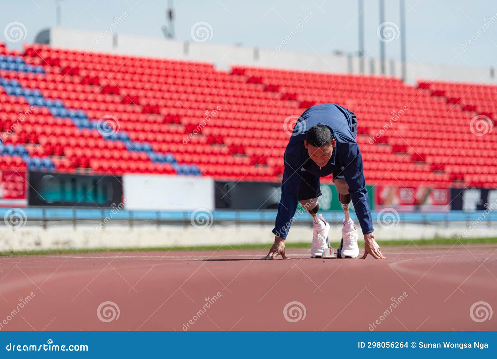 Disabled Athletes Prepare in Starting Position Ready To Run Stock Photo ...