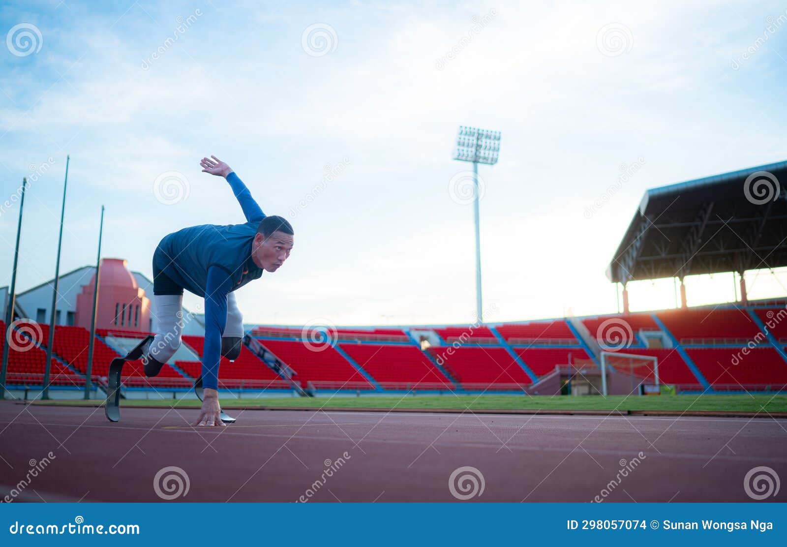 Disabled Athletes Prepare in Starting Position Ready To Run Stock Photo ...