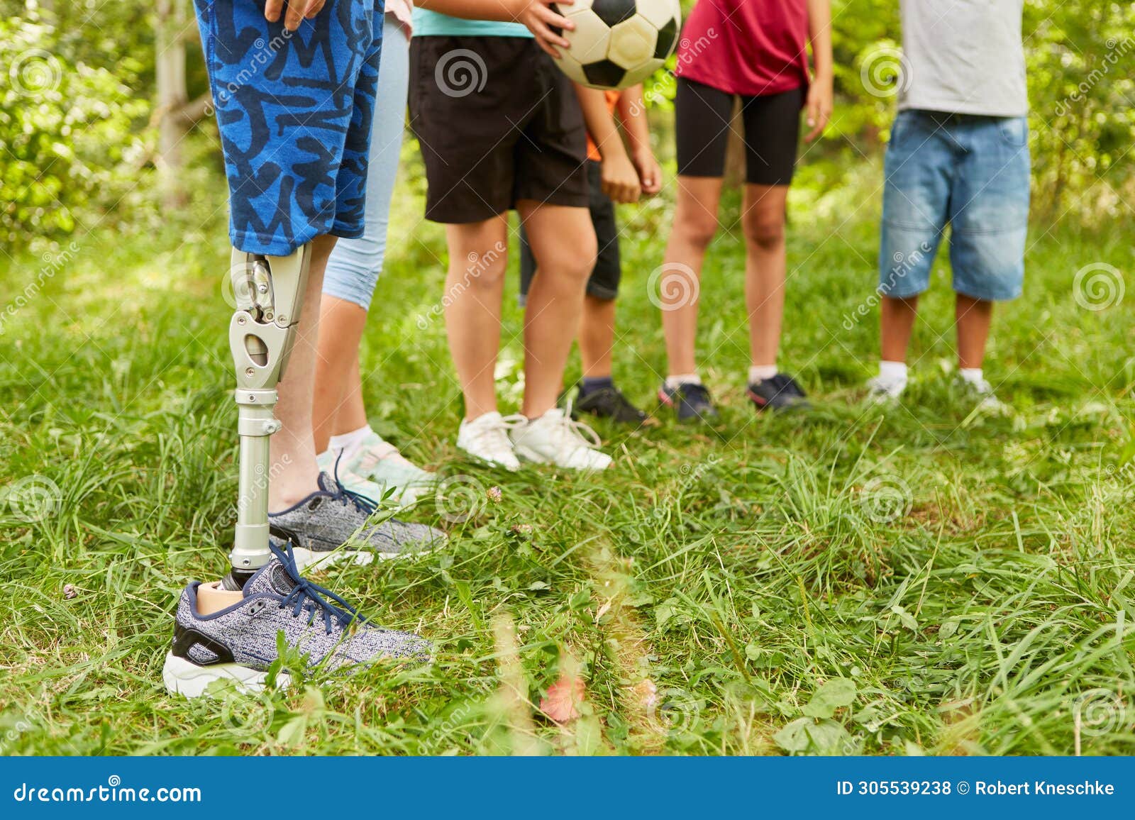 Disabled Boy Standing with Friends at Park Stock Photo - Image of limb ...
