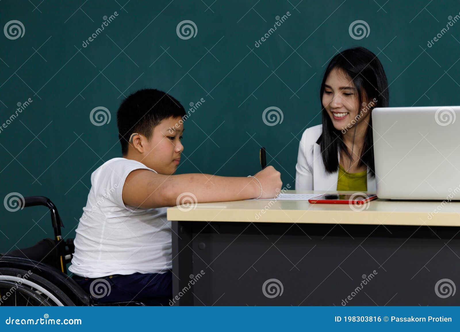 Disabled Boy Study with His Teacher. Stock Photo - Image of disable ...