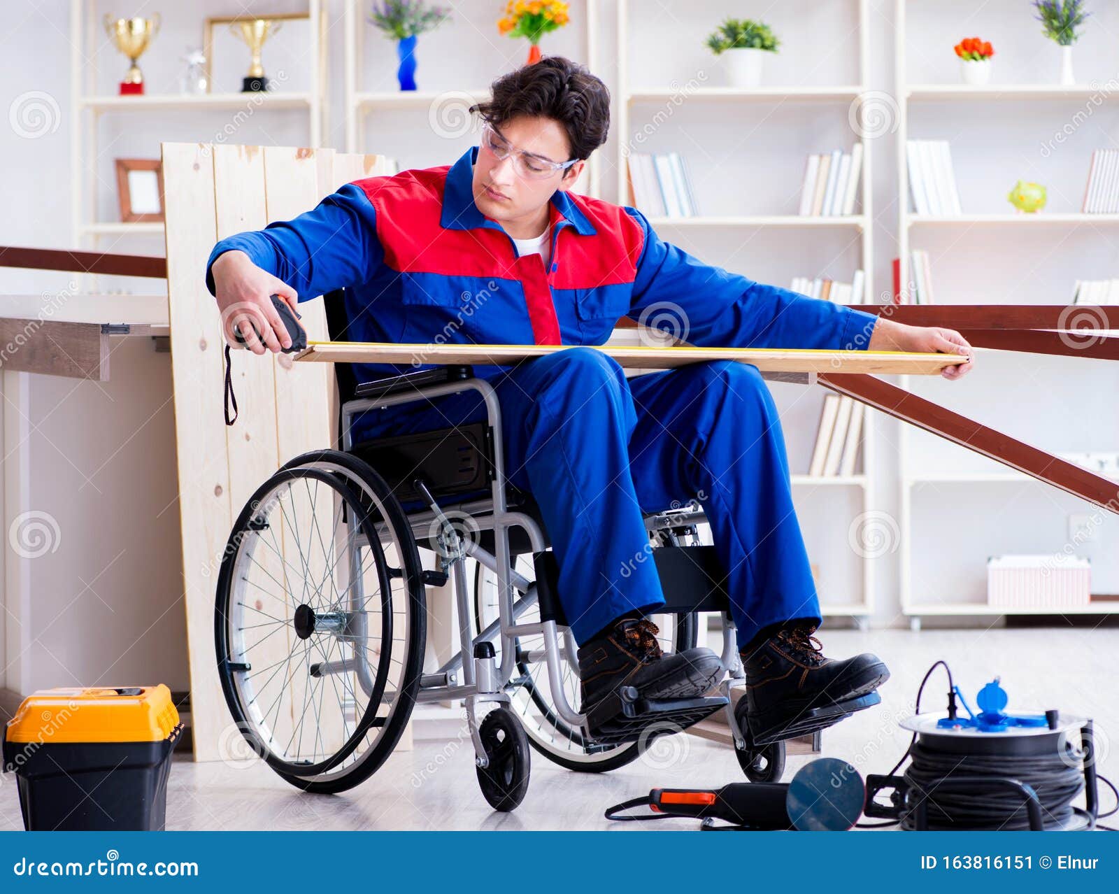 Disabled Carpenter Taking Measurement in Workshop Stock Image - Image ...