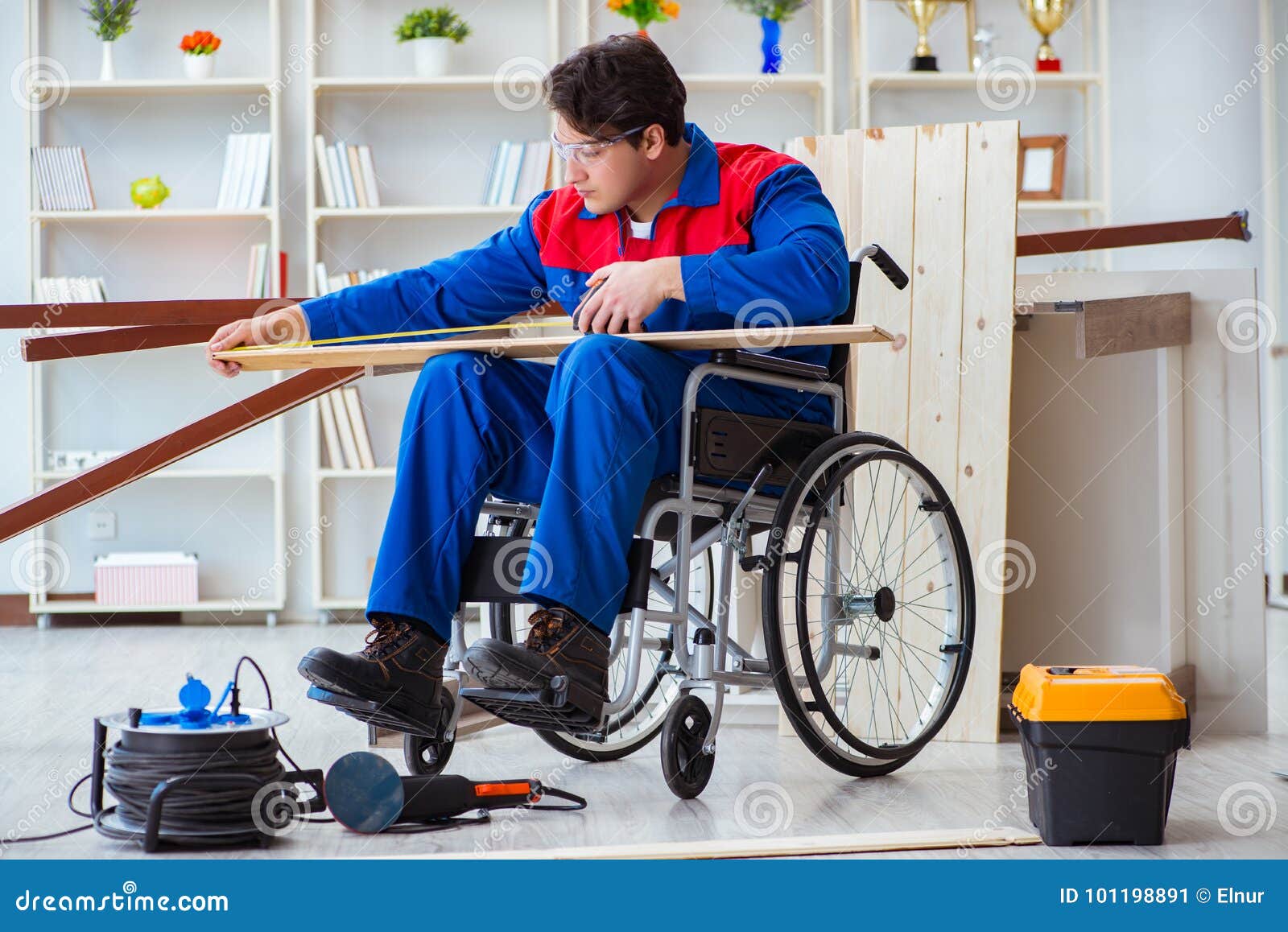 The Disabled Carpenter Taking Measurement in Workshop Stock Image ...