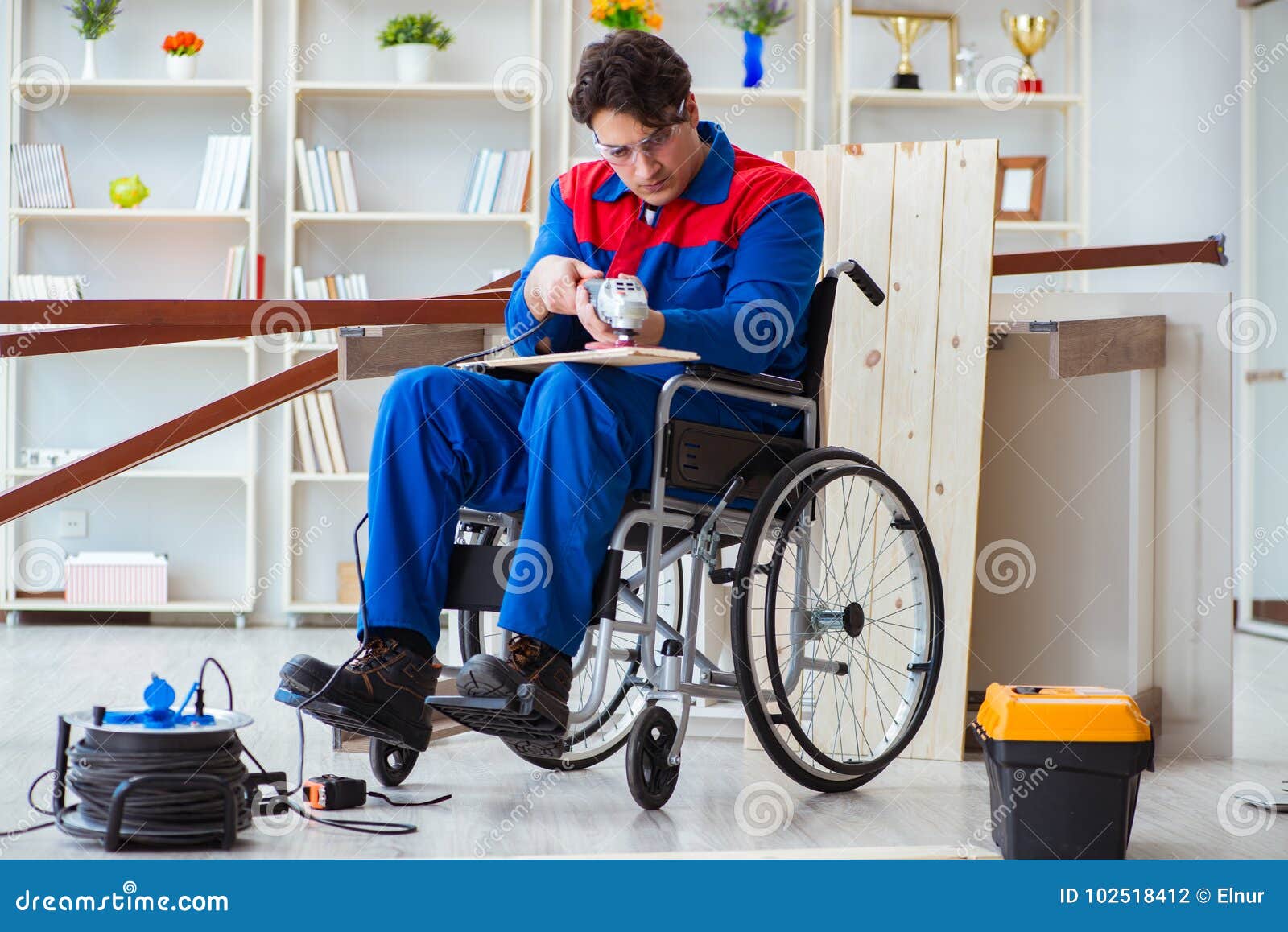 The Disabled Carpenter Working with Tools in Workshop Stock Photo ...