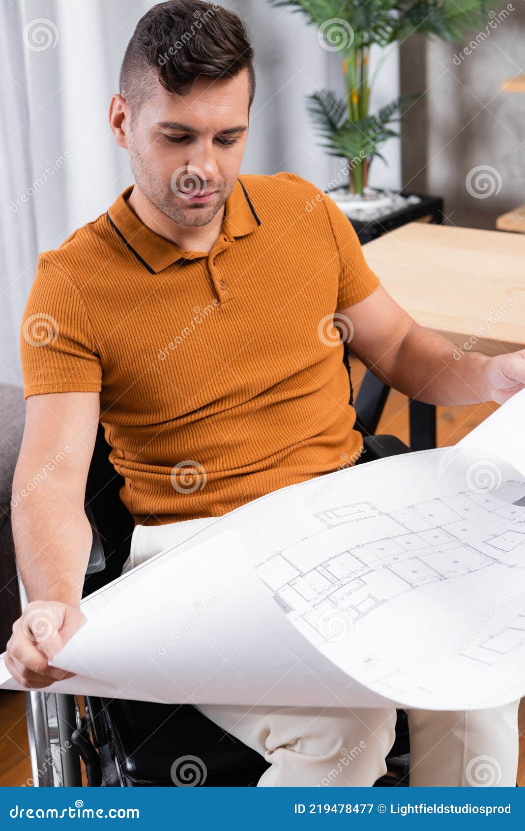 Disabled Engineer Looking at Blueprint while Stock Image - Image of ...