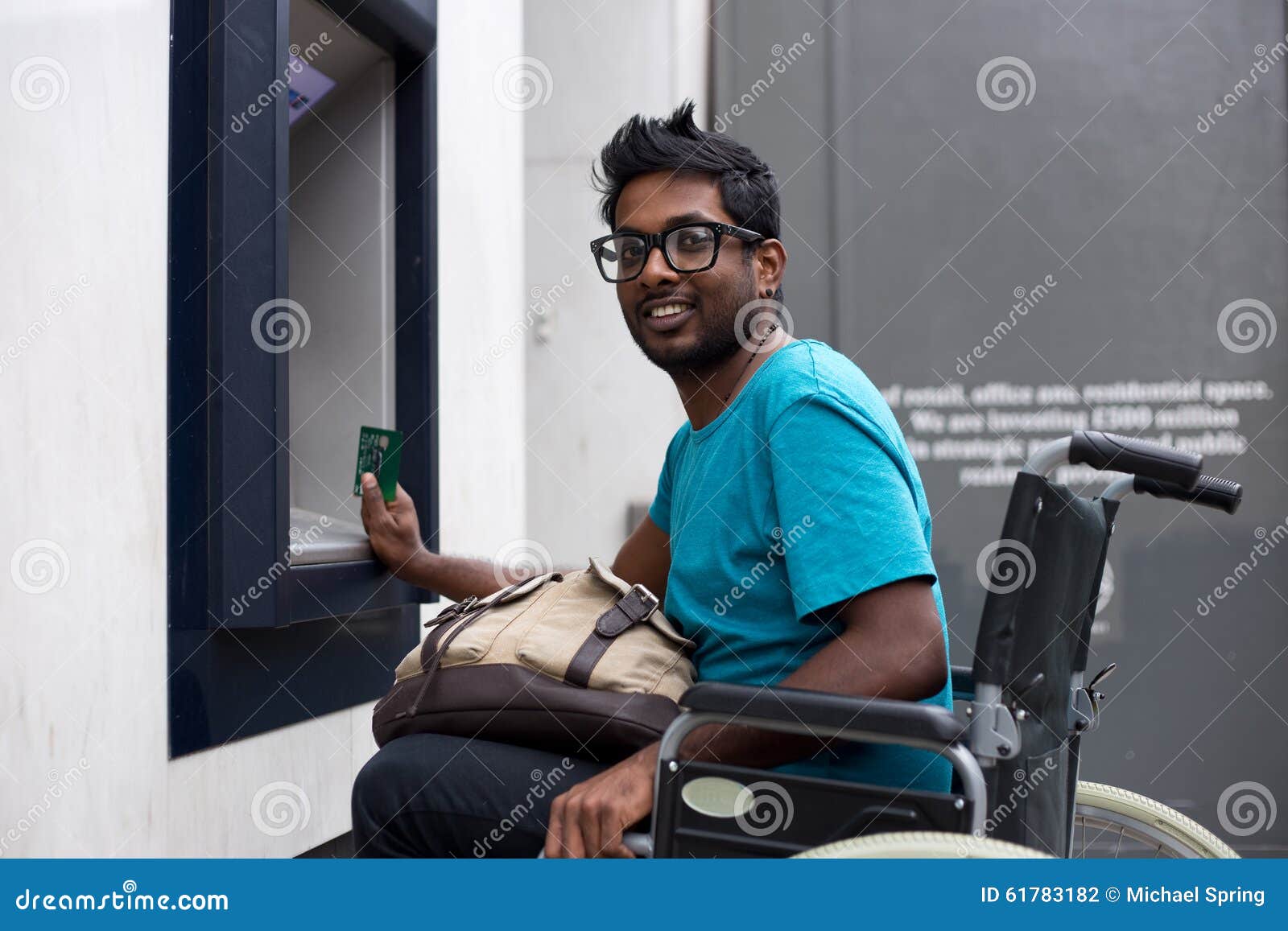 Disabled man at atm stock photo. Image of indian, disability - 61783182