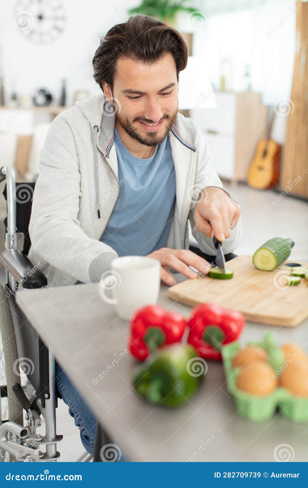 Disabled Man Cooking at Home Sitting Wheelchair Stock Image - Image of ...