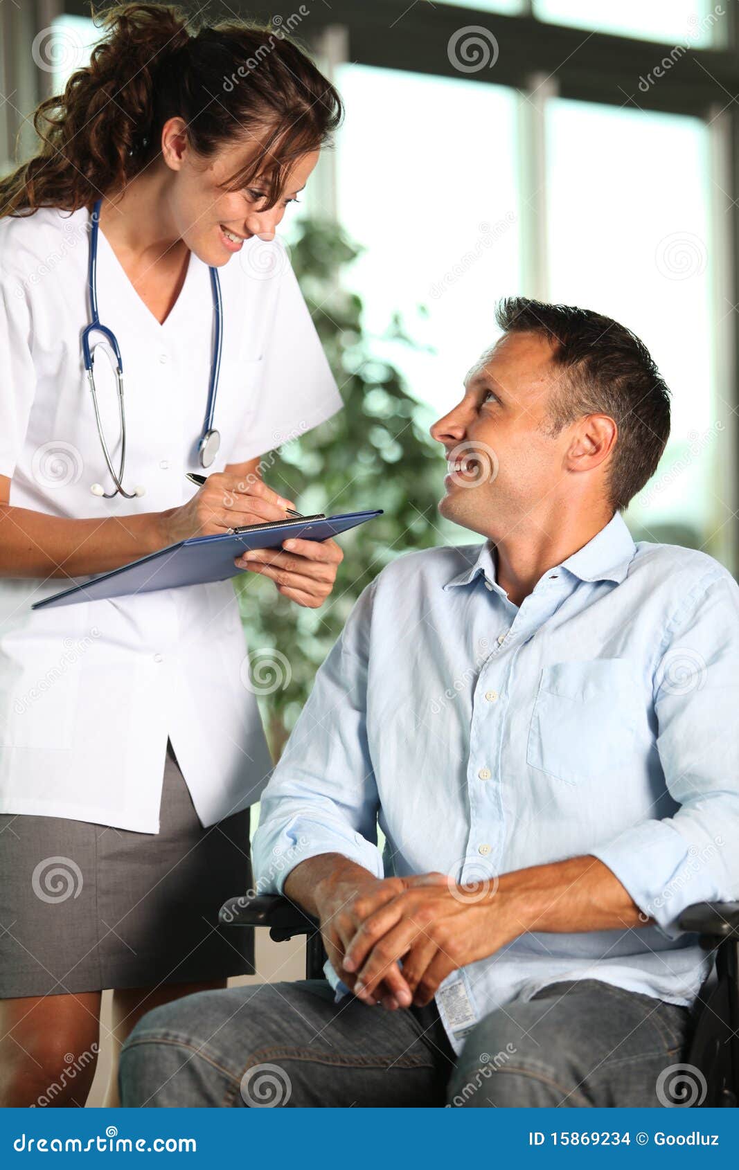 Disabled man with doctor stock photo. Image of hospital - 15869234