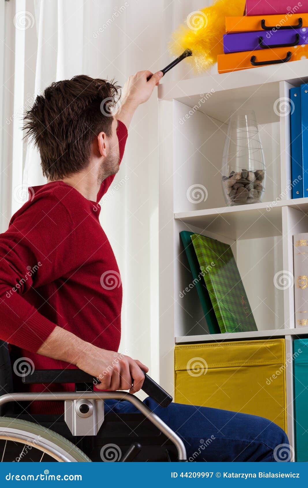 Disabled man doing dusting stock image. Image of duster - 44209997