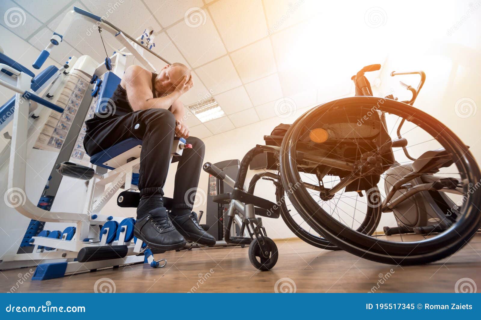Disabled Man Doing Strength Exercises Separate from the Wheelchair ...