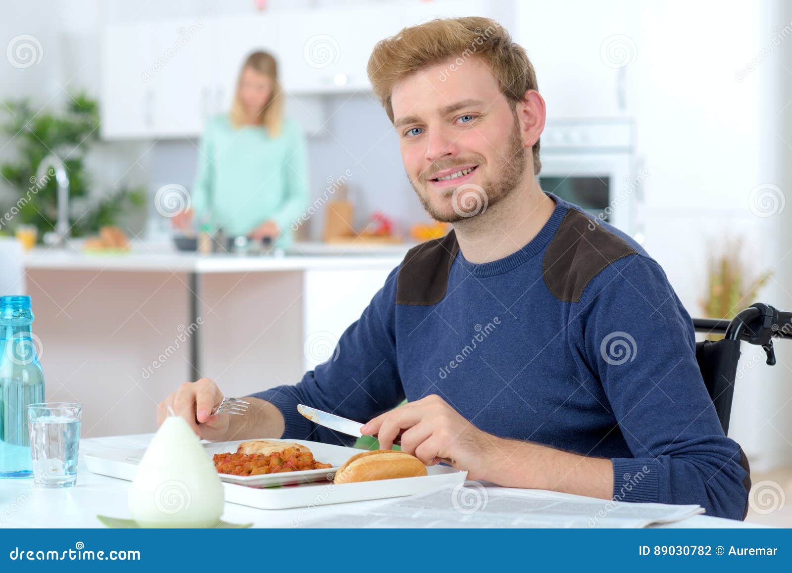 Disabled man eating lunch stock photo. Image of snack - 89030782