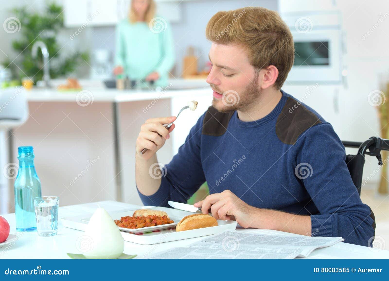 Disabled man eating meal stock image. Image of adult - 88083585